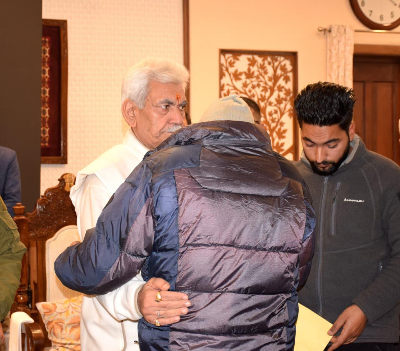 LG meets families of Nowgam blast martyrs, hands over appointment ...